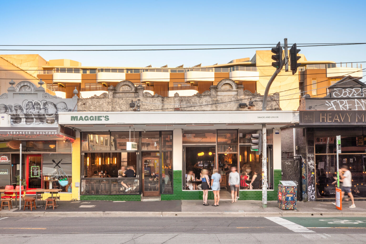Lively auction sees Melbourne’s prime shopping strip market pass ...